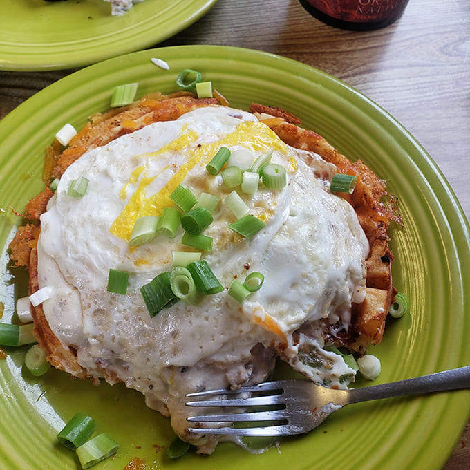 Avocado toast gets a hearty upgrade with perfectly fried eggs, proving healthy can also mean satisfying and delicious.