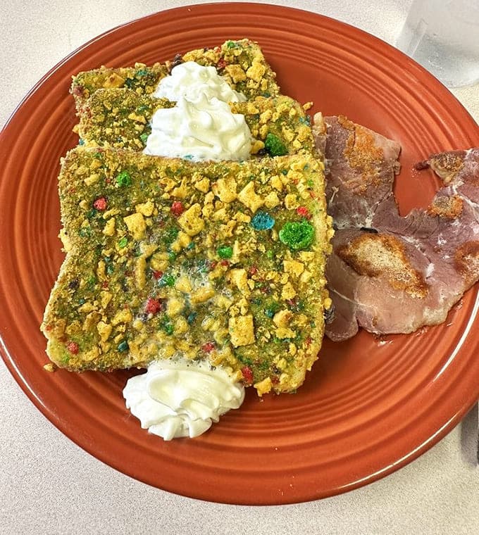 Captain Crunch French toast brings Saturday morning cartoon nostalgia to your breakfast plate, proving that sometimes the best ideas come from the cereal aisle.