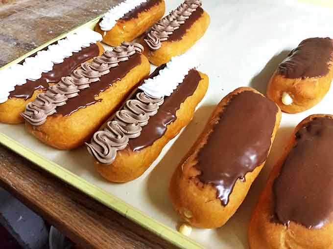 These chocolate eclairs are what happens when classic French pastry technique meets Detroit's no-nonsense commitment to generous portions and real flavor.