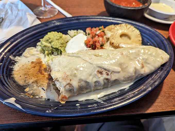 When a burrito meets a Philly cheesesteak, beautiful things happen, especially when cheese sauce is involved.