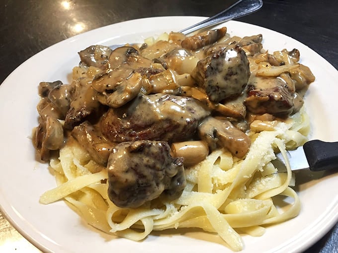 Tender beef and mushrooms in rich gravy over egg noodles proves this kitchen's talents extend far beyond the grill.