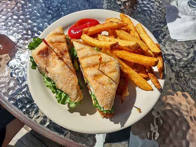 This sandwich situation comes with fries that actually look crispy, not like sad, limp afterthoughts someone threw on the plate.