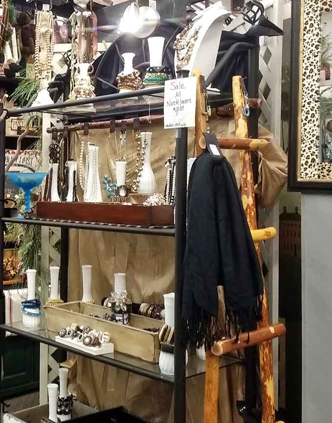 Vintage jewelry and collectibles arranged with care &ndash; each shelf a miniature museum of American craftsmanship and design evolution.