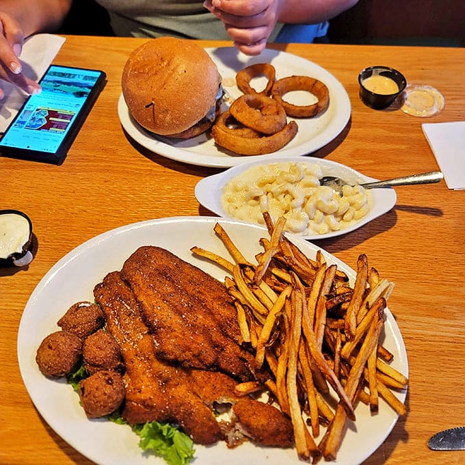 Comfort food elevated: crispy fish paired with hand-cut fries and creamy mac and cheese that would make grandma secretly jealous.