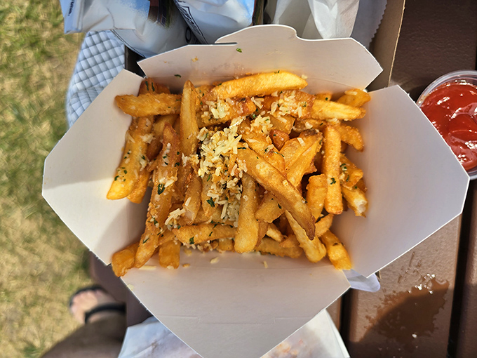Golden, crispy fries dusted with herbs and parmesan &ndash; the perfect sidekick to Maine's seafood royalty.