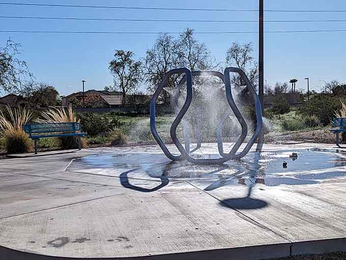 The water feature adds a refreshing element to the park, because even futuristic playgrounds understand that Arizona heat is no joke.