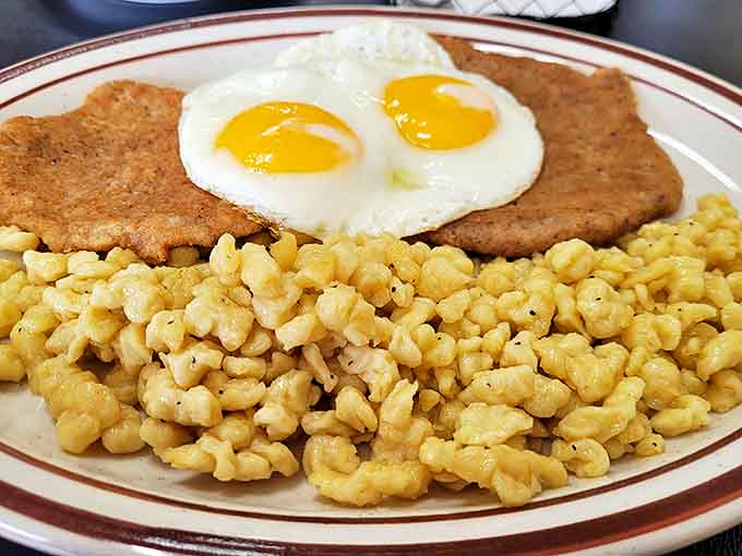 The German pasta arrives looking deceptively simple, but one bite reveals the complex, satisfying texture that only comes from handmade noodles.