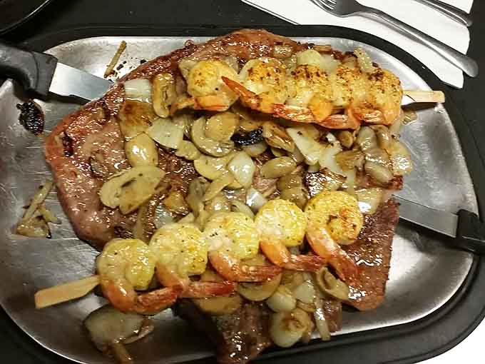 When surf meets turf on a sizzling platter, magic happens, especially when shrimp and steak share the spotlight with saut&eacute;ed perfection.
