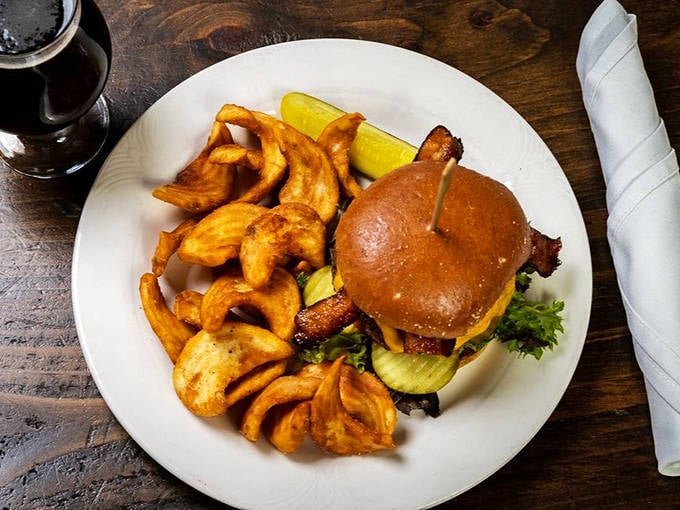Not just any burger &ndash; this hand-formed patty on a brioche bun with curly fries could make fast food weep with inadequacy.
