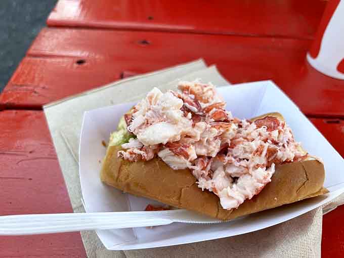 A lobster roll so generously stuffed, it makes you wonder if they know something about portion control that they're deliberately ignoring.