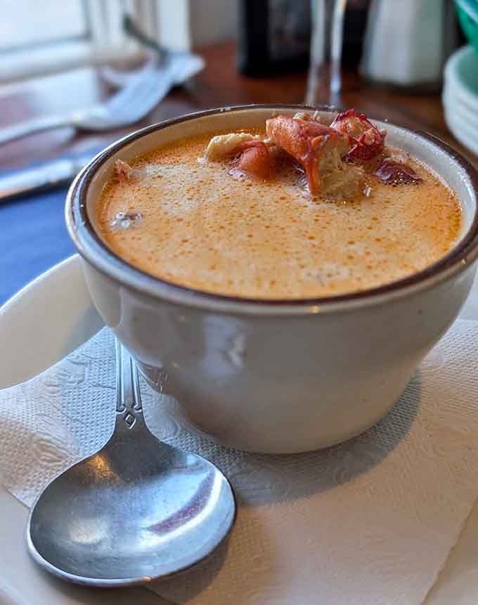 That creamy broth studded with tender lobster chunks represents everything right about coastal Maine dining, comfort and luxury in one perfect bowl.