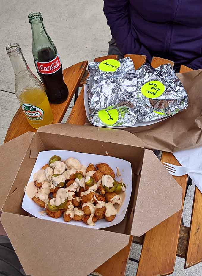 Nashville Hot Cheese Curds bring the heat with a crispy coating and cooling chipotle sour cream to save the day.