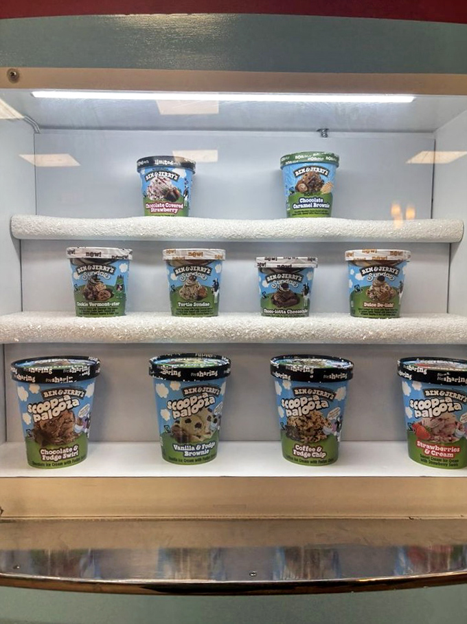 The refrigerated case displays pints of Ben & Jerry's classics. Each represents a flavor that fought the good fight and lived to tell the tale.