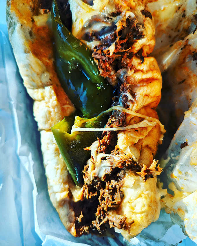 Not just a one-hit wonder, Jimmy's Italian beef sandwich delivers tender, seasoned meat tucked into soft bread with that perfect pepper kick.