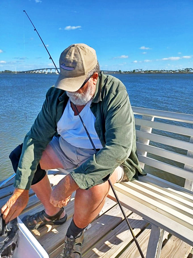 The ancient dance between angler and fish plays out on Jensen Beach's docks, where patience isn't just a virtue &ndash; it's the price of dinner.