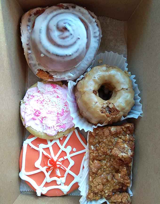 This assortment of donuts proves that variety is the spice of life, assuming spice means sugar and frosting.
