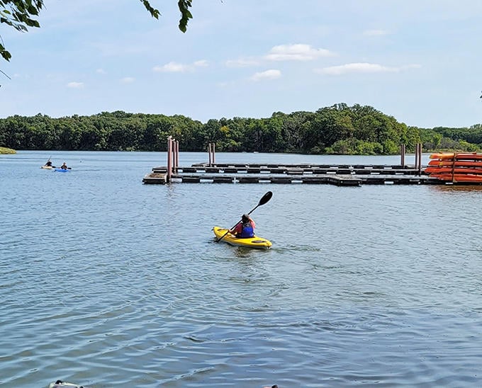 Nothing says "I'm living my best life" quite like gliding across Busse Lake in a sunshine-yellow kayak.