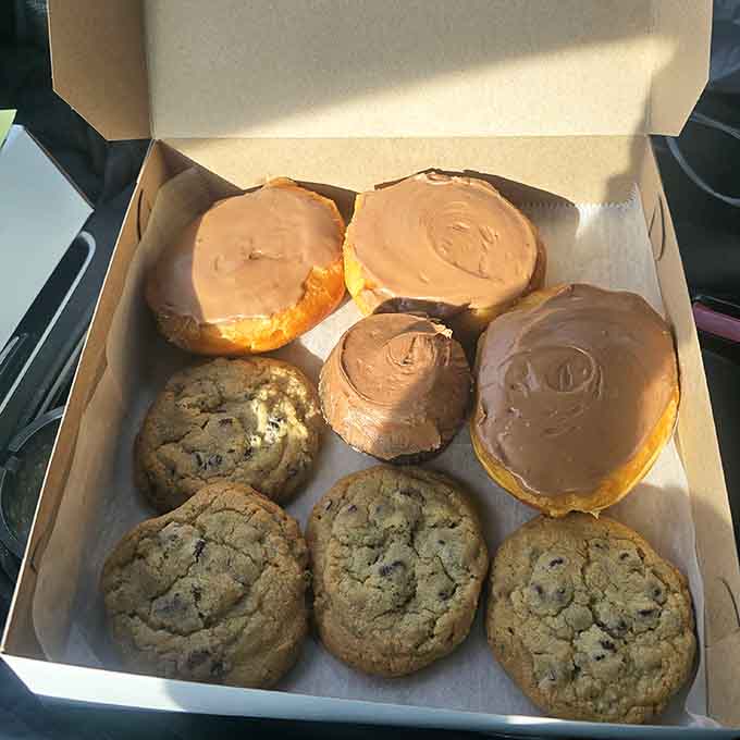 When cookies and donuts share a box, everybody wins, especially whoever gets to eat these generously-sized chocolate chip cookies and glazed beauties together.