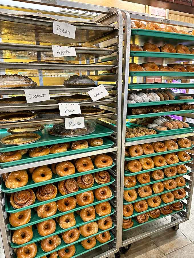 Those rolling racks of donuts and pastries represent hours of early morning work and decades of perfected recipes, all waiting to make your day better.