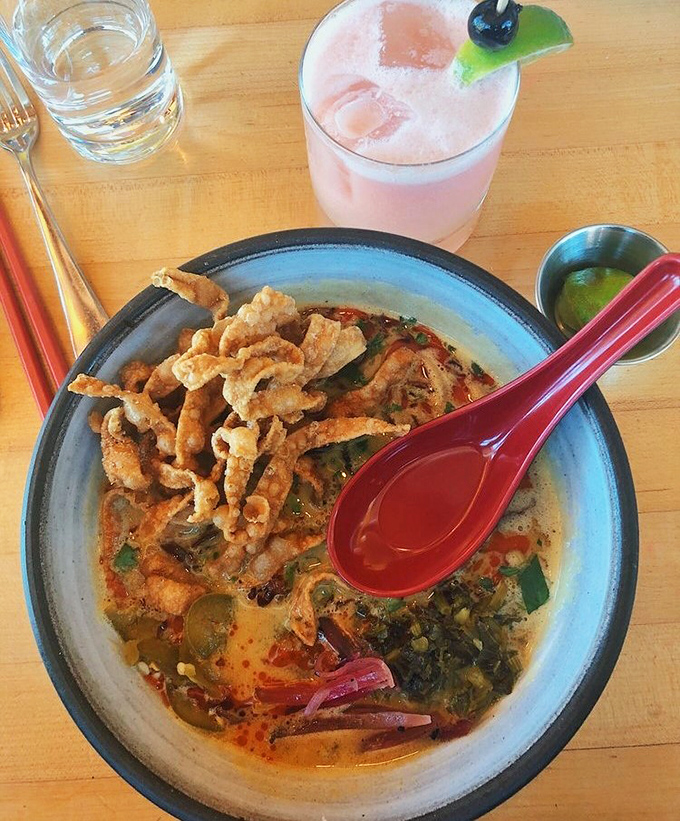 A bowl of liquid gold cradling tender smoked lamb, fresh herbs, and noodles that have achieved that mythical perfect chew. Slurping strongly encouraged.