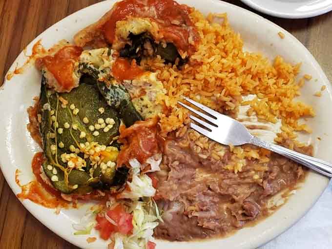 The cheese-stuffed Chile Relleno sits majestically on the plate, surrounded by rice and beans that are far better than typical side dishes.