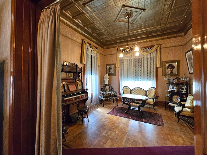 Piano? Check. Ornate furniture? Double check. This living room is ready for a rousing game of charades or a scandalous gossip session.