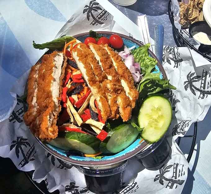 Fresh greens topped with crispy chicken prove that Long Bridge Bar takes everything seriously, even salads.