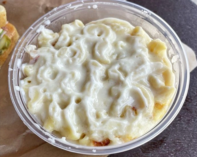 Velvety smooth macaroni swimming in a cheese sauce so good you'll want to bathe in it. Diet starts tomorrow!