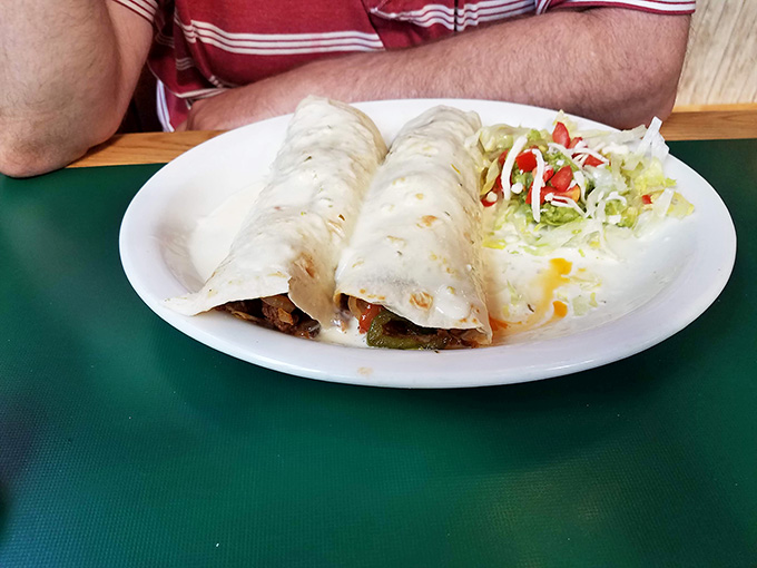 Two beautiful burritos flanking fresh salad prove that Maria's understands balance, even if you're about to throw that balance out the window.