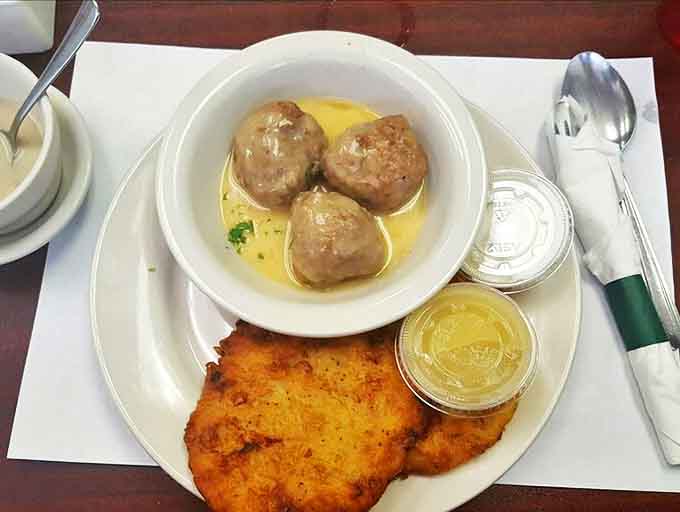 Polish comfort food doesn't get better than this: tender meatballs alongside golden potato pancakes that grandma would approve of.