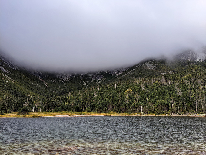 Moody mountain majesty: Even when clouds embrace Katahdin's summit, the dramatic basin creates an atmosphere of wilderness mystery.