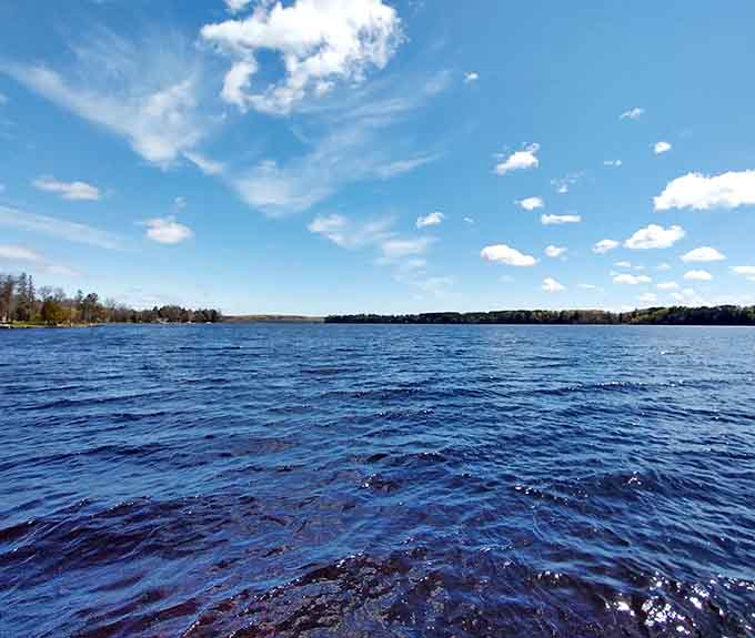 The deep blue waters of Moose Lake look so inviting, you'll understand why people have been coming here for generations.