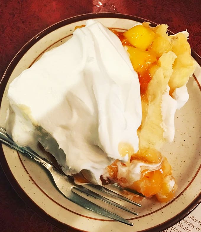 Peach cream pie so pretty it almost seems wrong to eat it, but you'll get over that feeling real quick.