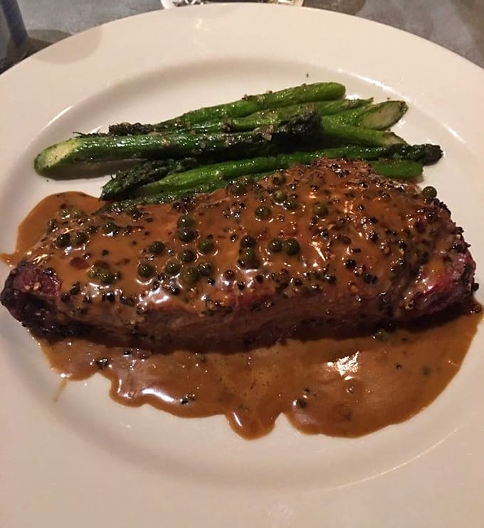 That peppercorn-crusted steak with asparagus proves that sometimes simple preparations yield the most spectacular results on your plate.