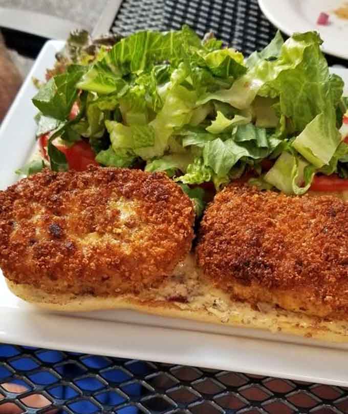 When crab cakes meet fresh greens, magic happens on the plate, creating a combination that's both satisfying and surprisingly light for something this flavorful.