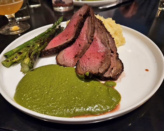 This hanger steak with chimichurri proves the kitchen's skills extend far beyond their famous paella, delivering perfectly cooked beef every time.