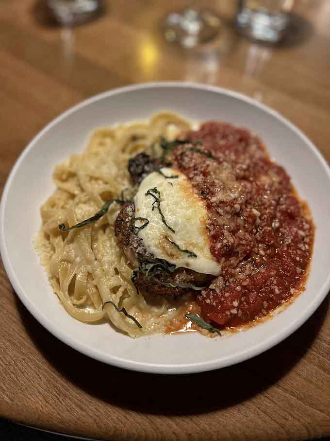 Chicken Parmesan gets the gourmet treatment here, with perfectly breaded chicken nestled in rich sauce alongside tender pasta.