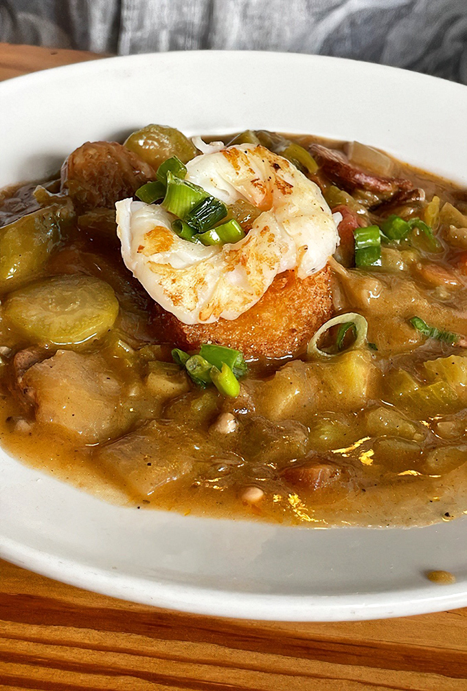 Okeechobee Gumbo &ndash; a bowl of Florida heritage with each spoonful. That plump shrimp perched on top is like the cherry on a very savory sundae.