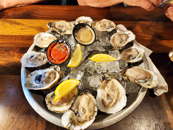 Fresh oysters, nature's briny jewels. These glistening beauties are just begging to be slurped, each one a taste of the ocean's finest.