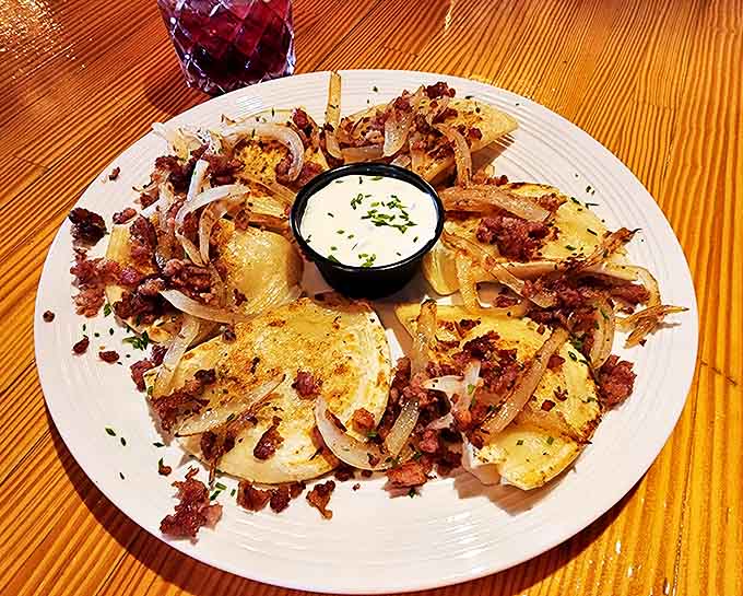The perfect pierogi equation: tender dough + savory filling + crispy bacon + caramelized onions = a plate you'll be thinking about for weeks.