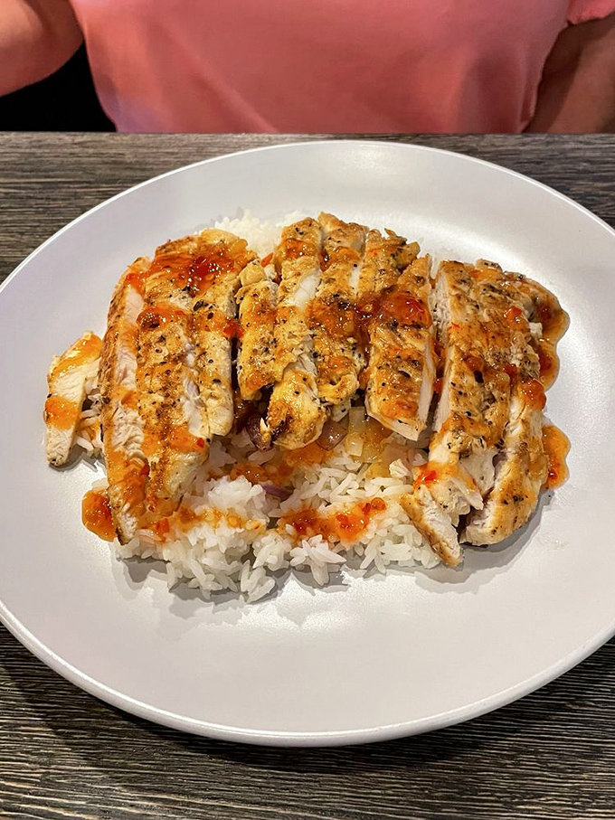 Who says bar food can't be healthy? Succulent grilled chicken over fluffy rice with sauce that'll make you forget you're eating virtuously.