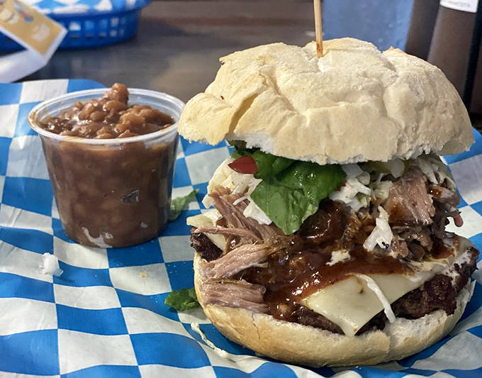 A perfect marriage: juicy pulled pork burger alongside beans that have clearly been simmering with purpose and conviction for hours.