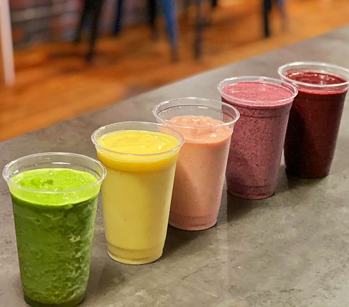 A rainbow lineup of smoothies proves that eating (or drinking) your colors has never looked this good or tasted this amazing.