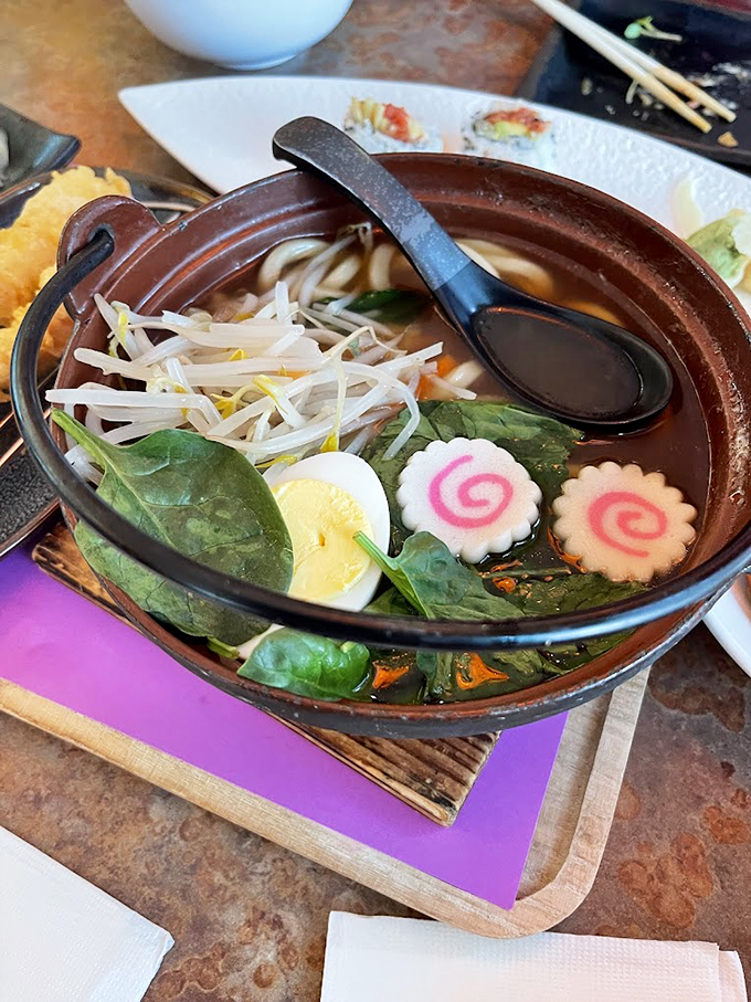 Slurp your way to happiness! This steaming bowl of ramen is like a warm hug for your insides, complete with all the fixings.