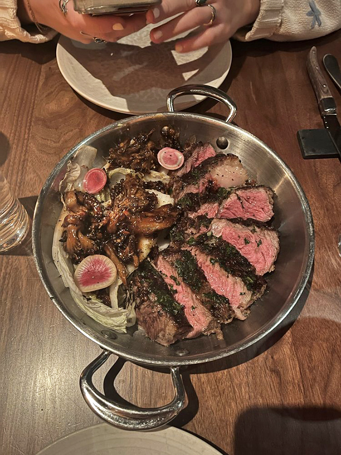 This perfectly cooked ribeye with mushrooms and watermelon radish slices isn't just dinner – it's edible art with serious flavor credentials.