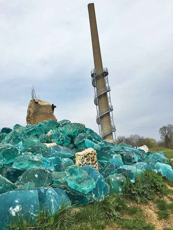 Not your average rock collection! These massive chunks of blue glass honor the site's glass-making heritage with a splash of industrial artistry.