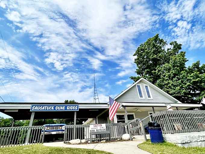 The classic white building with its patriotic flag and covered boarding area looks like it could be from a Norman Rockwell painting, if Rockwell had painted extreme sand adventures.
