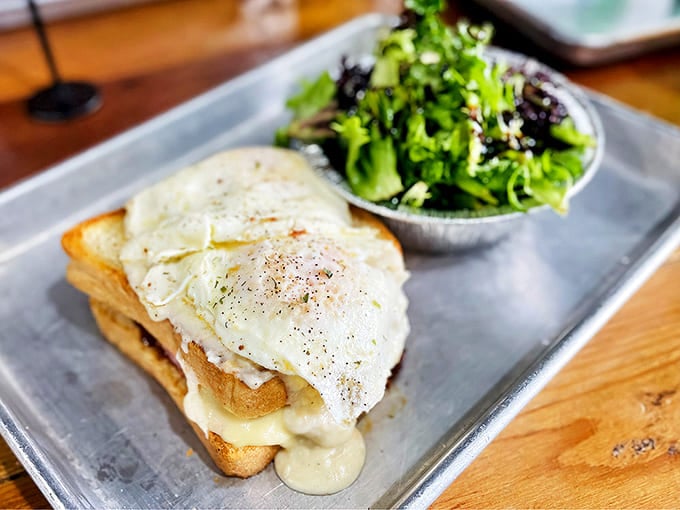 Perfectly fried eggs crown this masterpiece, where melty cheese meets toasty bread in a breakfast symphony that demands to be savored slowly.