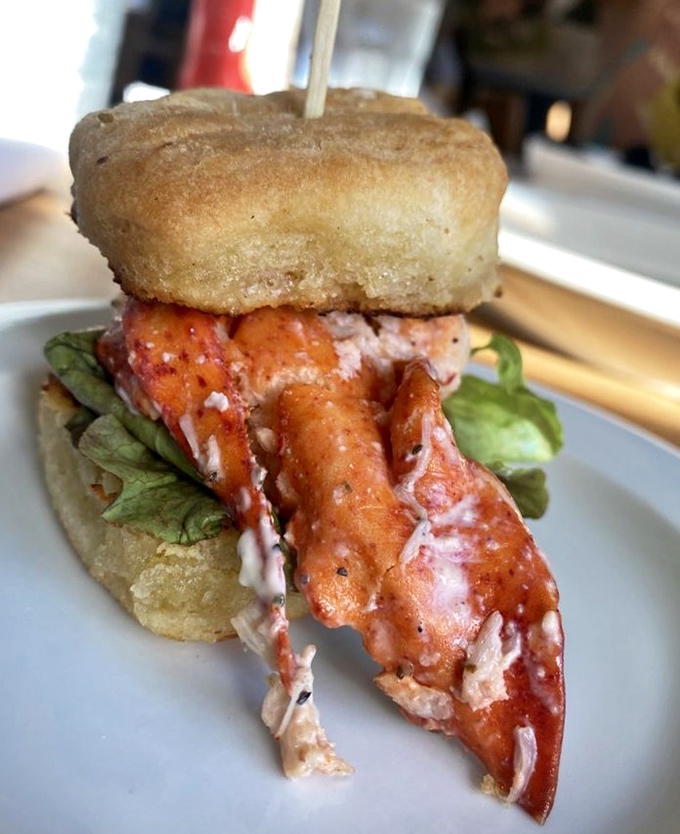 The single lobster slider &ndash; a masterclass in simplicity. Sweet, tender claw meat barely dressed, letting Maine's ocean bounty speak for itself.