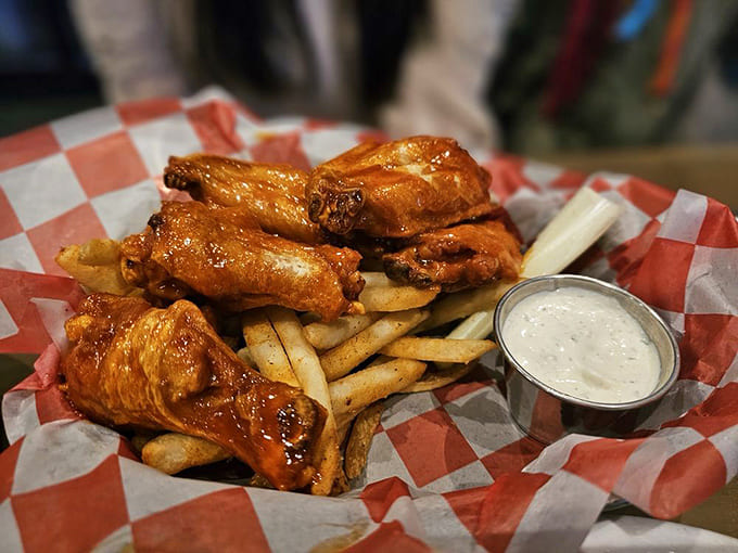 Crispy wings glazed to perfection alongside golden fries prove that sometimes the classics are classic for a reason.